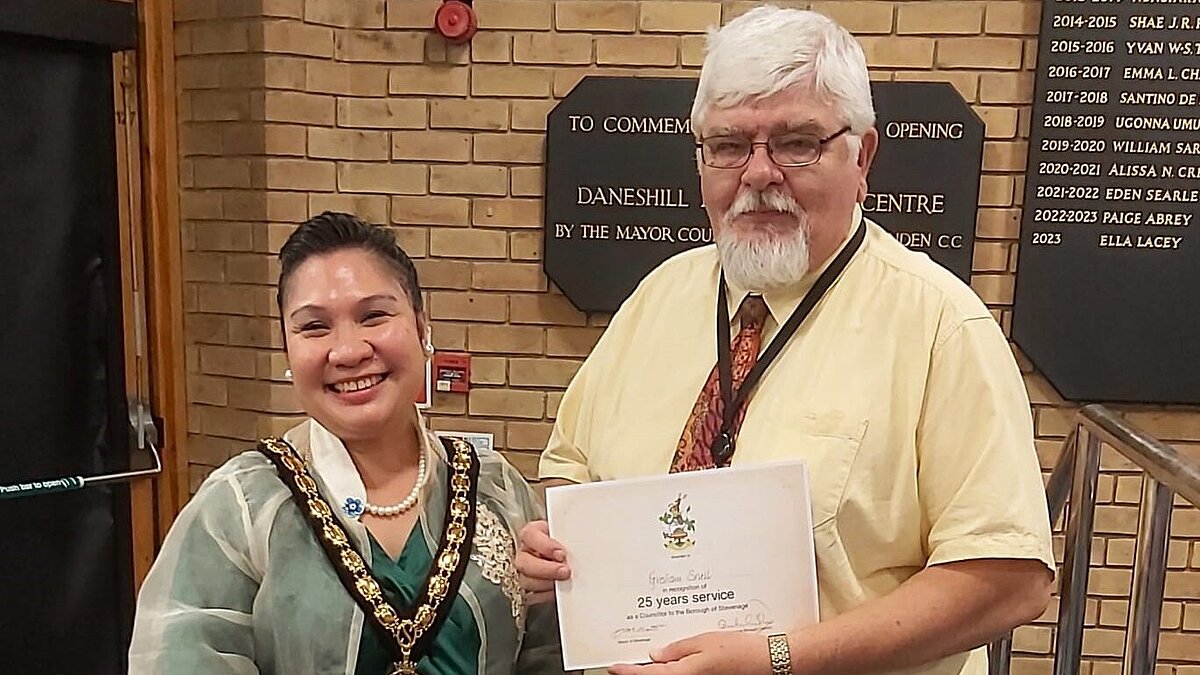 Cllr Graham Snell presented with 25 year service award - North ...